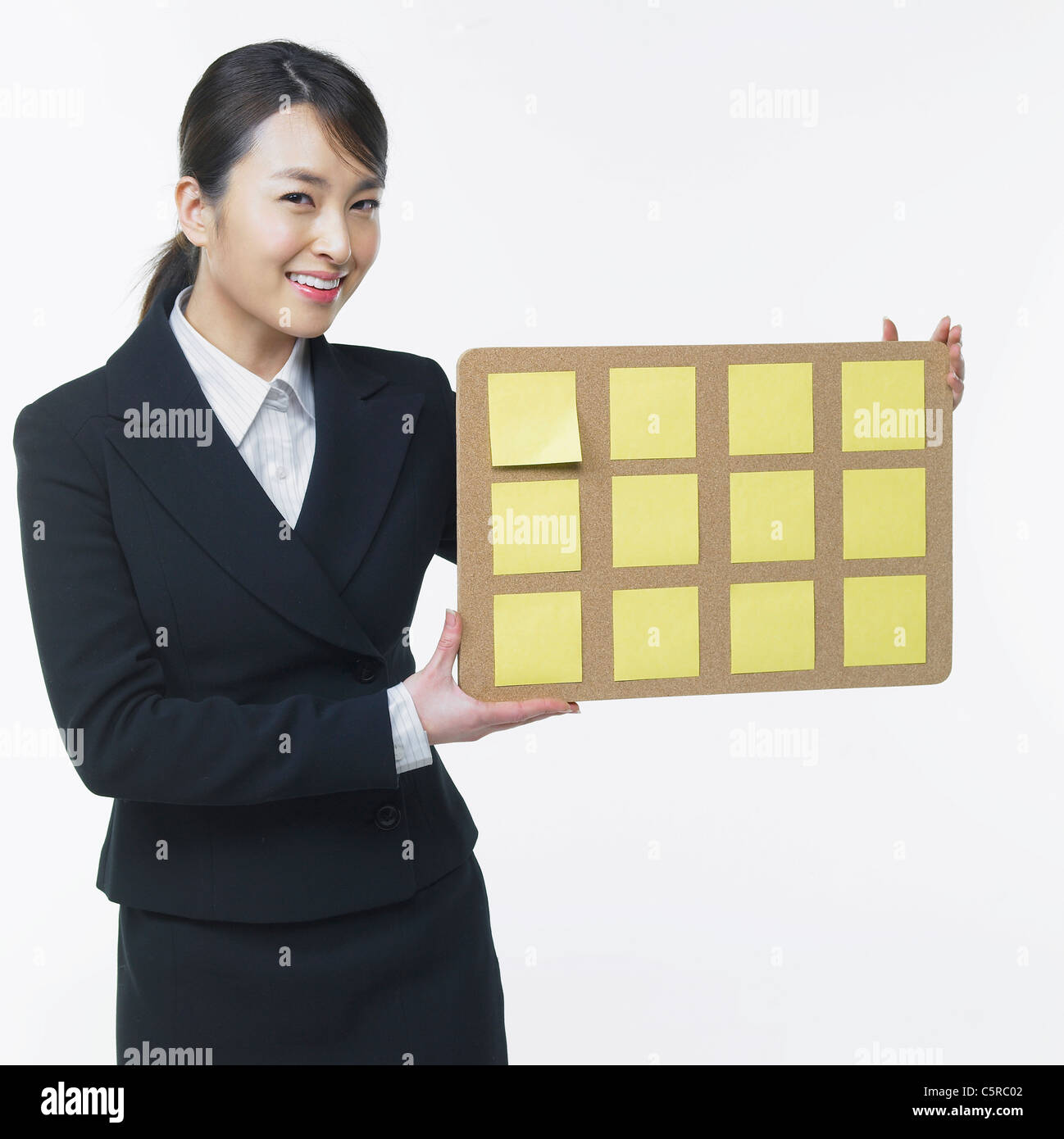 A woman holding message board Stock Photo - Alamy