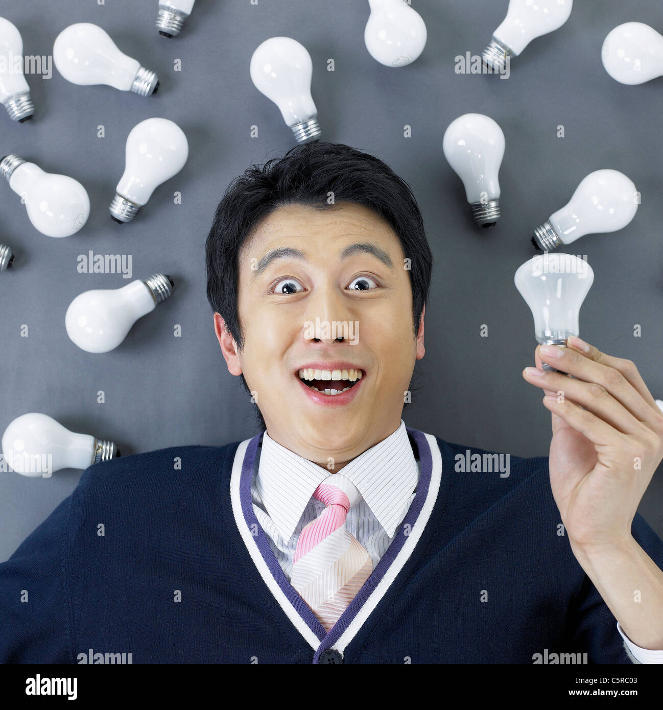 A man with light bulbs Stock Photo - Alamy