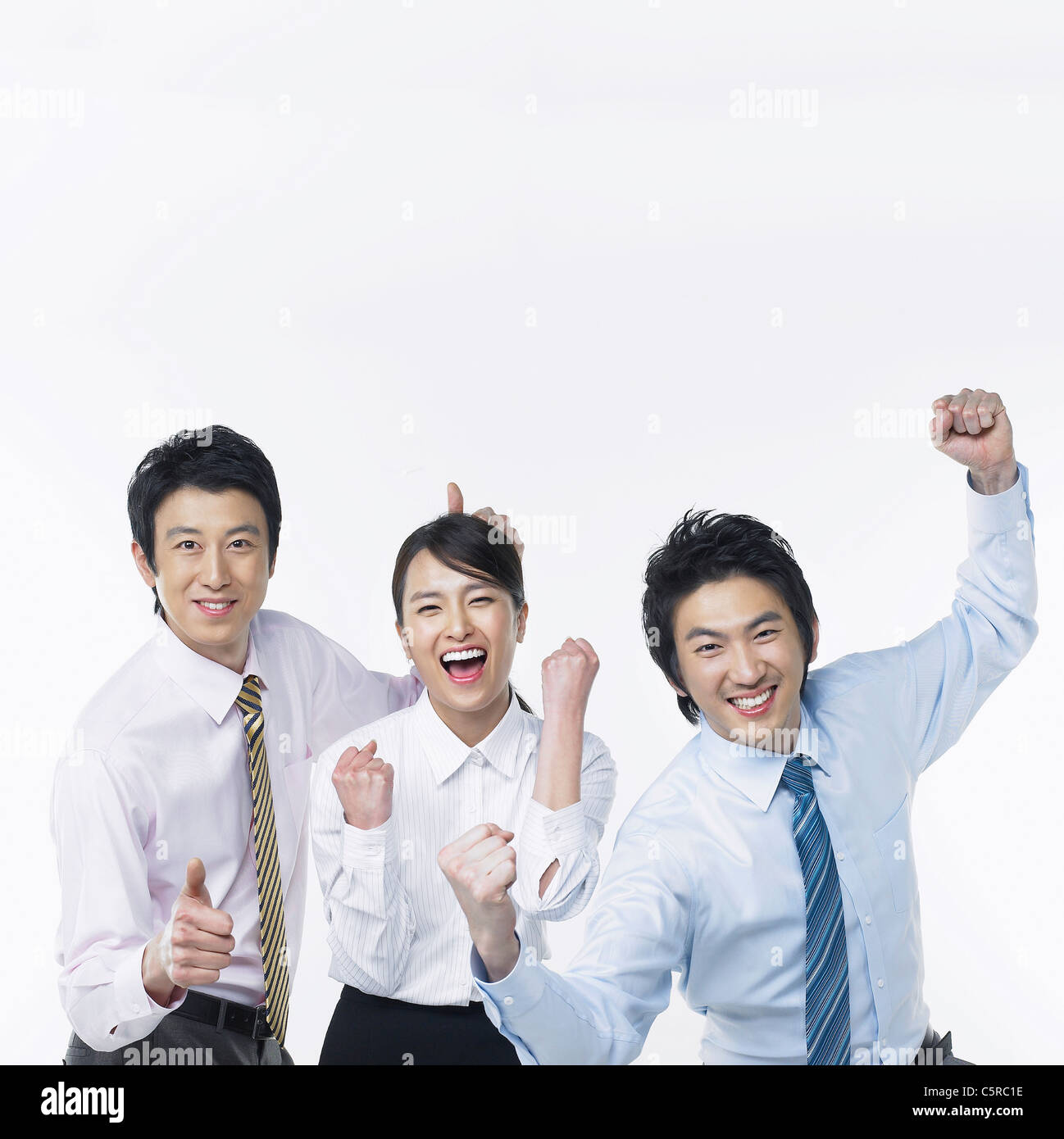 Three people with joy Stock Photo - Alamy