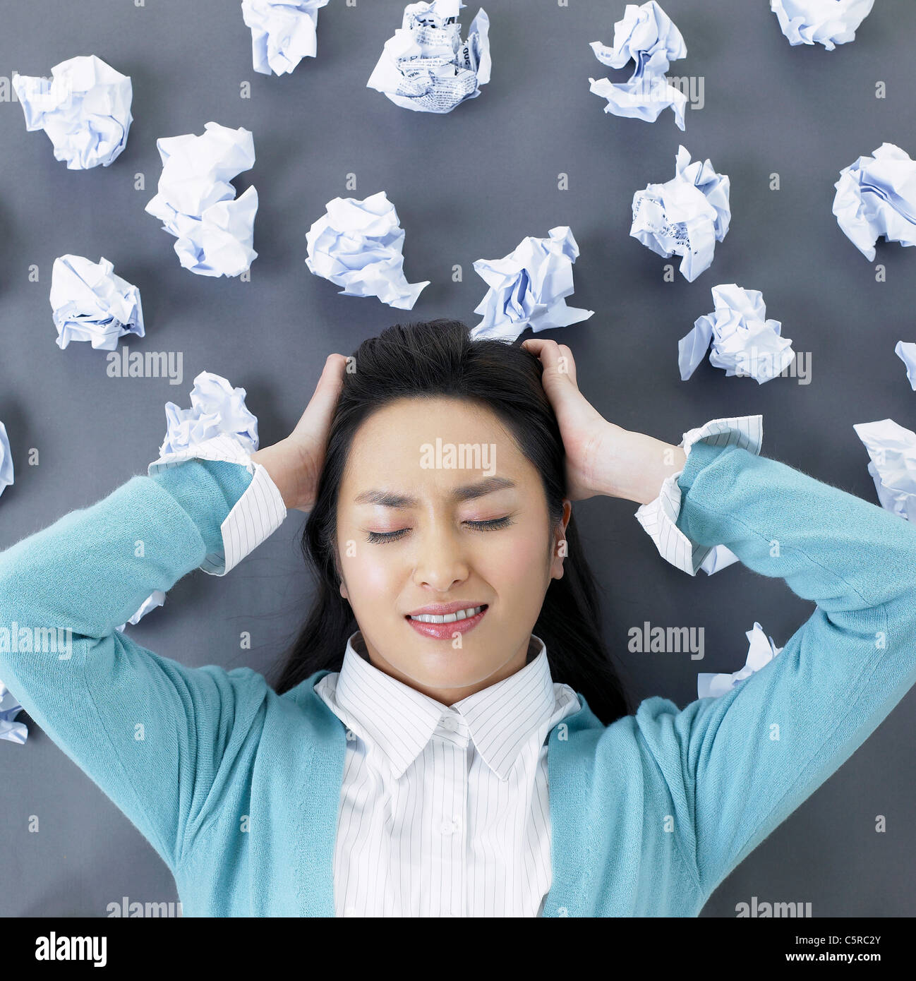A woman in agony thinking Stock Photo - Alamy
