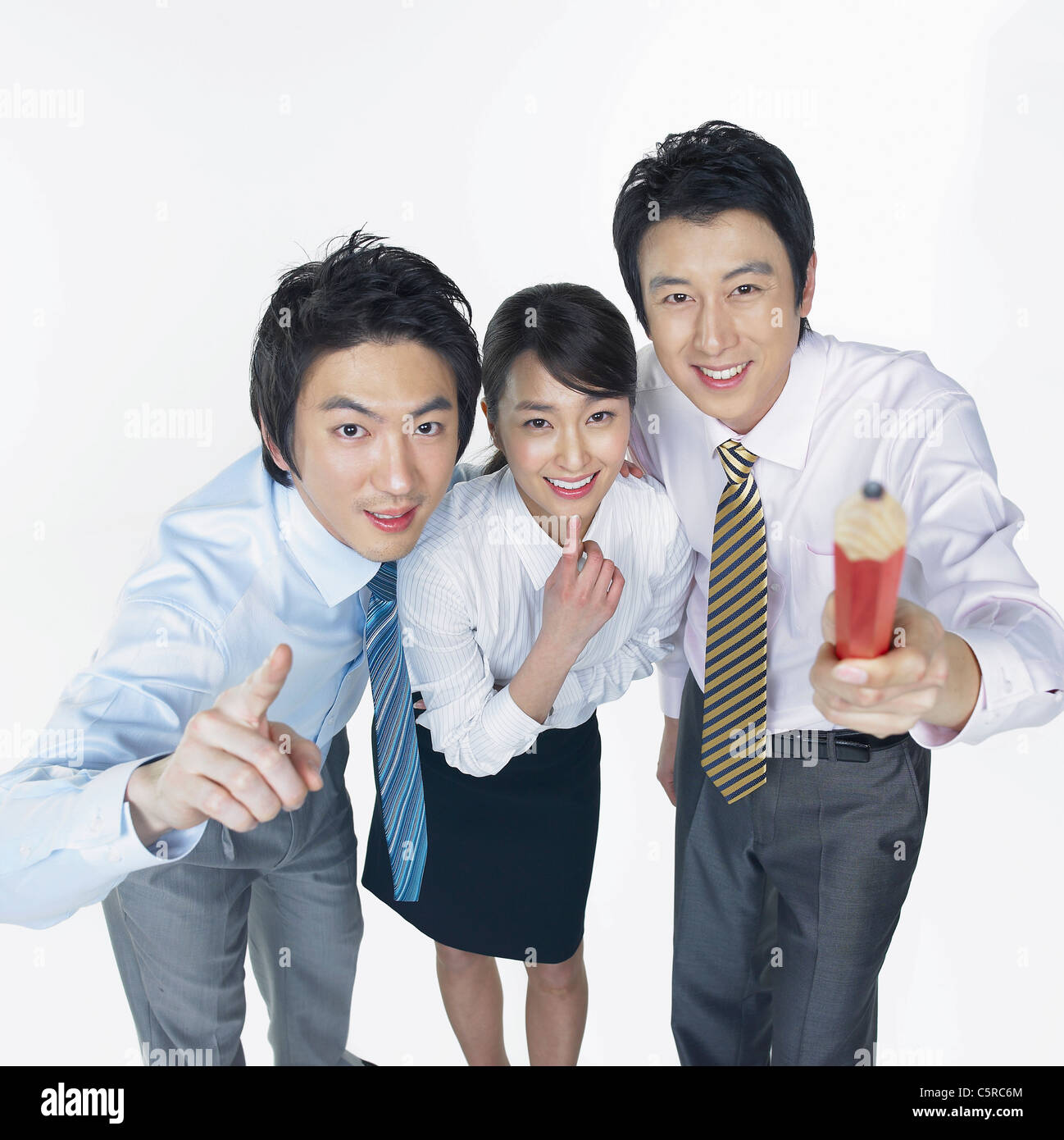 Three people pointing at the camera Stock Photo - Alamy