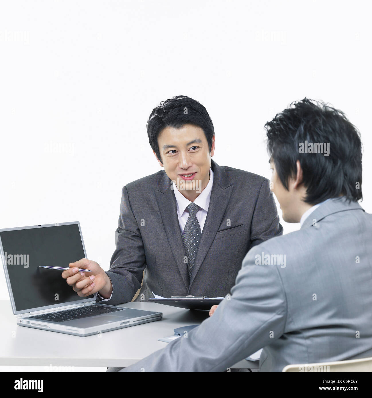 Two men having a meeting Stock Photo - Alamy