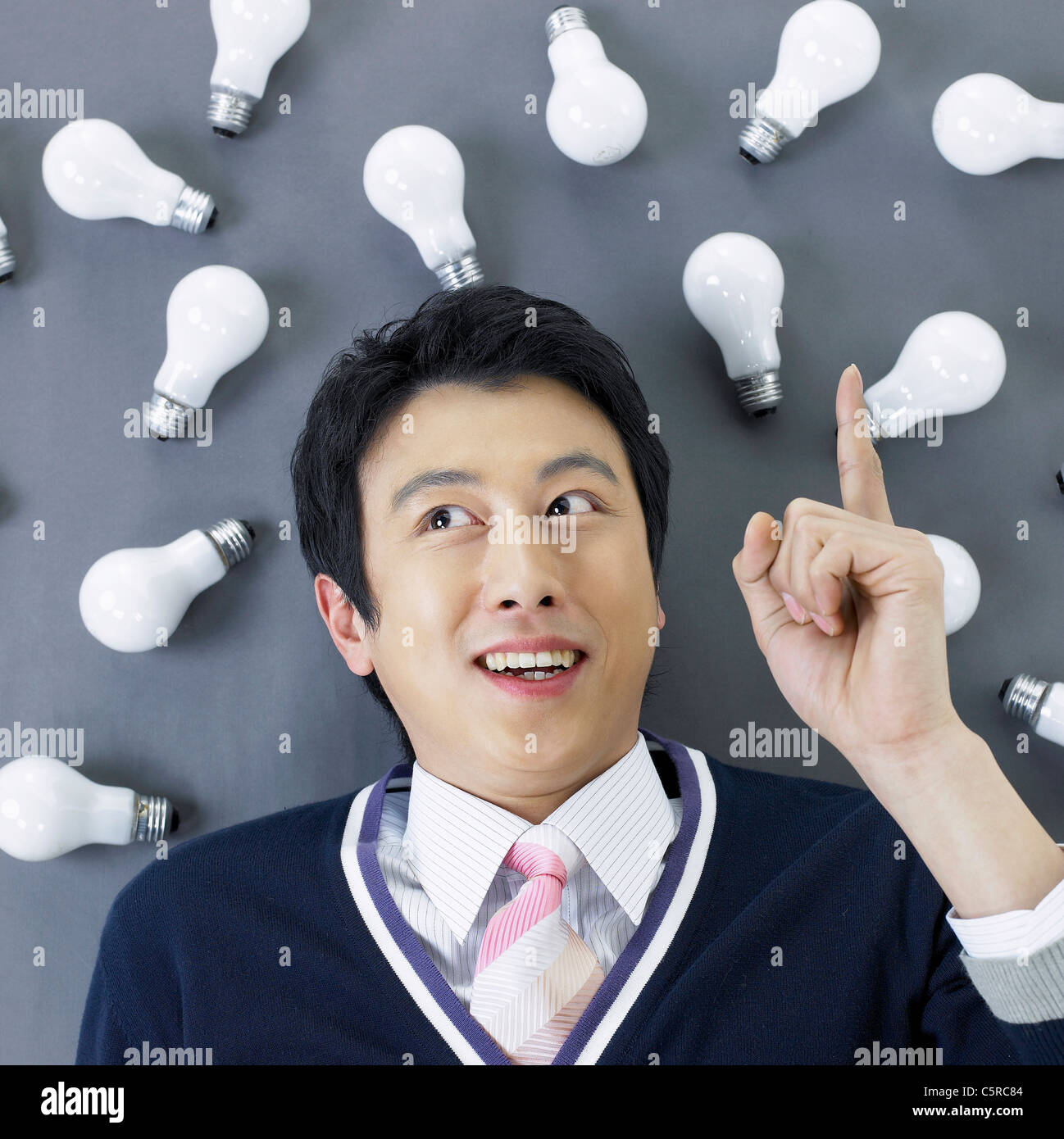 A man with light bulbs Stock Photo - Alamy