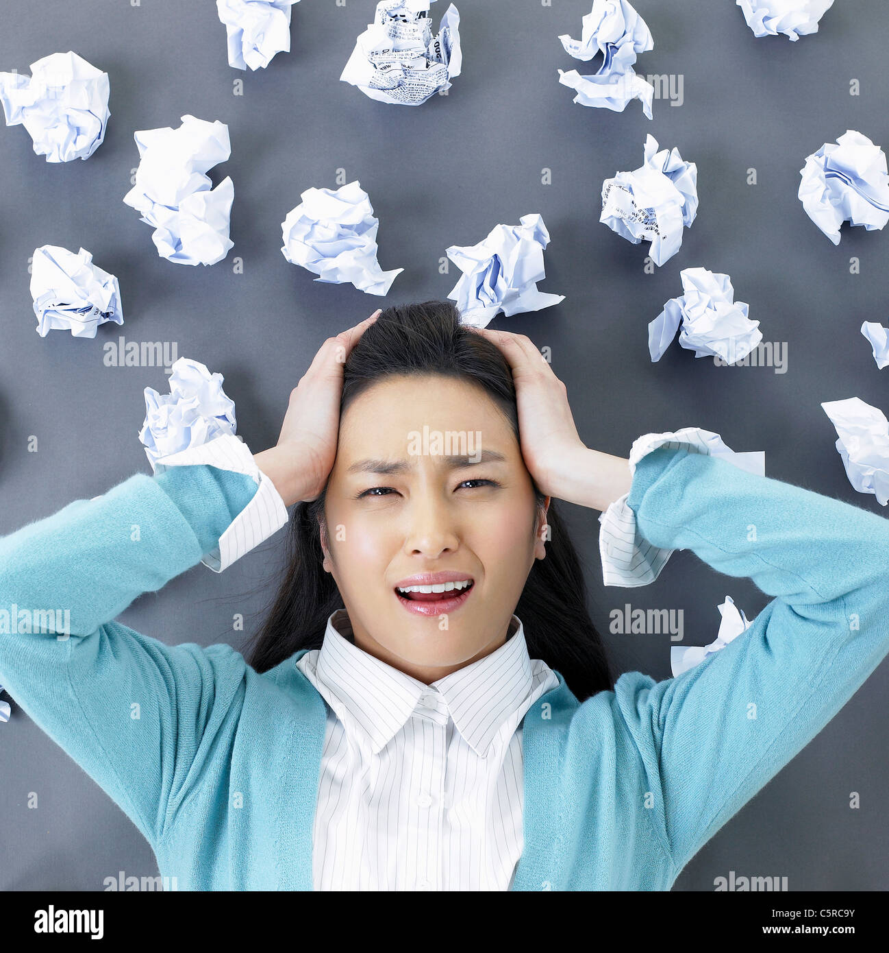 A woman in agony thinking Stock Photo - Alamy