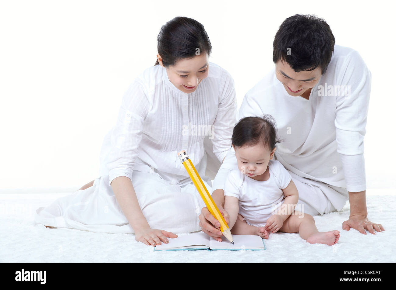 Mom dad helping studying hi-res stock photography and images - Alamy