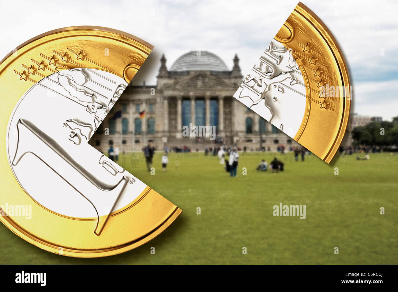 Germany, Berlin, One Euro coin with quarter piece in front of German ...