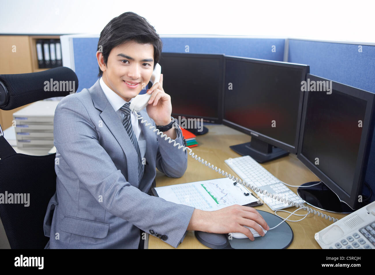 A business man taking a phone call Stock Photo - Alamy