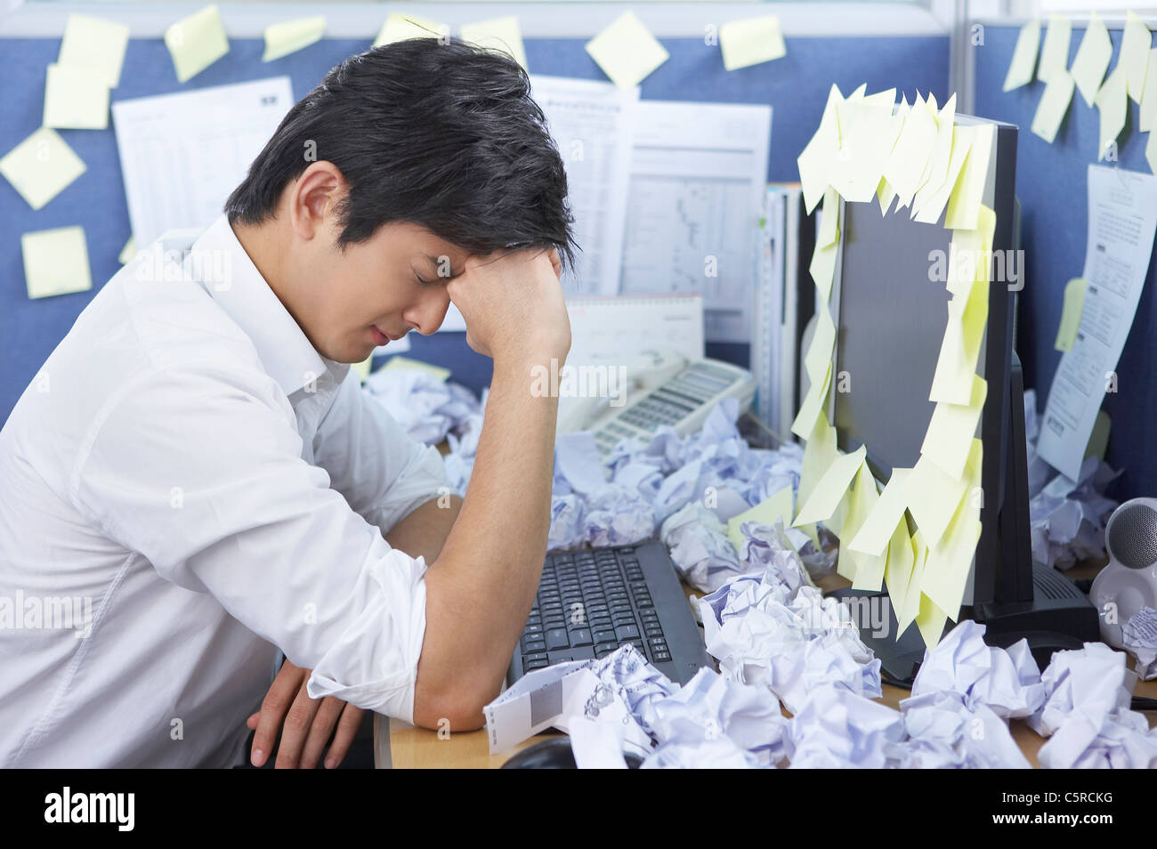 Man in dirty desk hi-res stock photography and images - Alamy