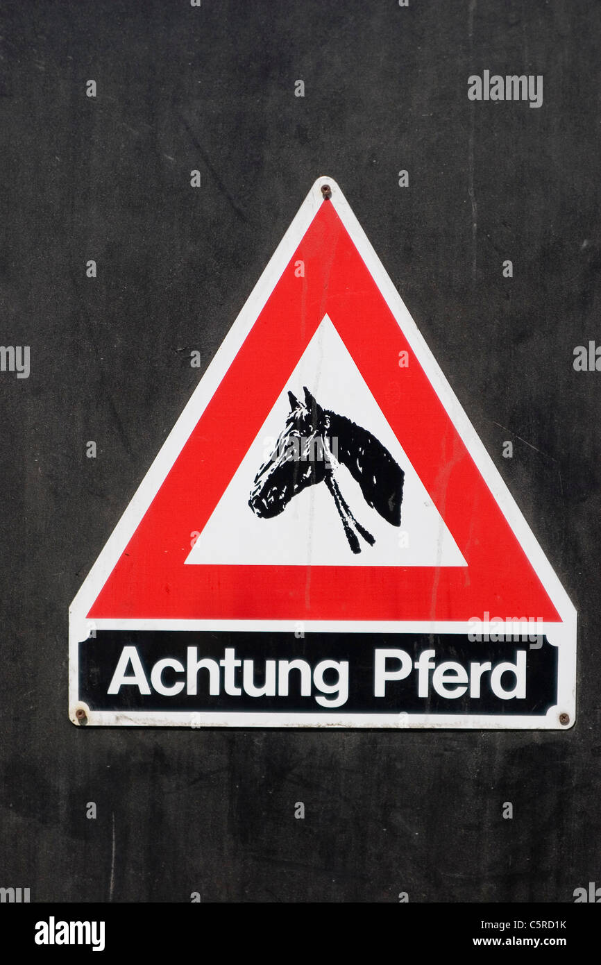 Warning sign, close-up Stock Photo - Alamy