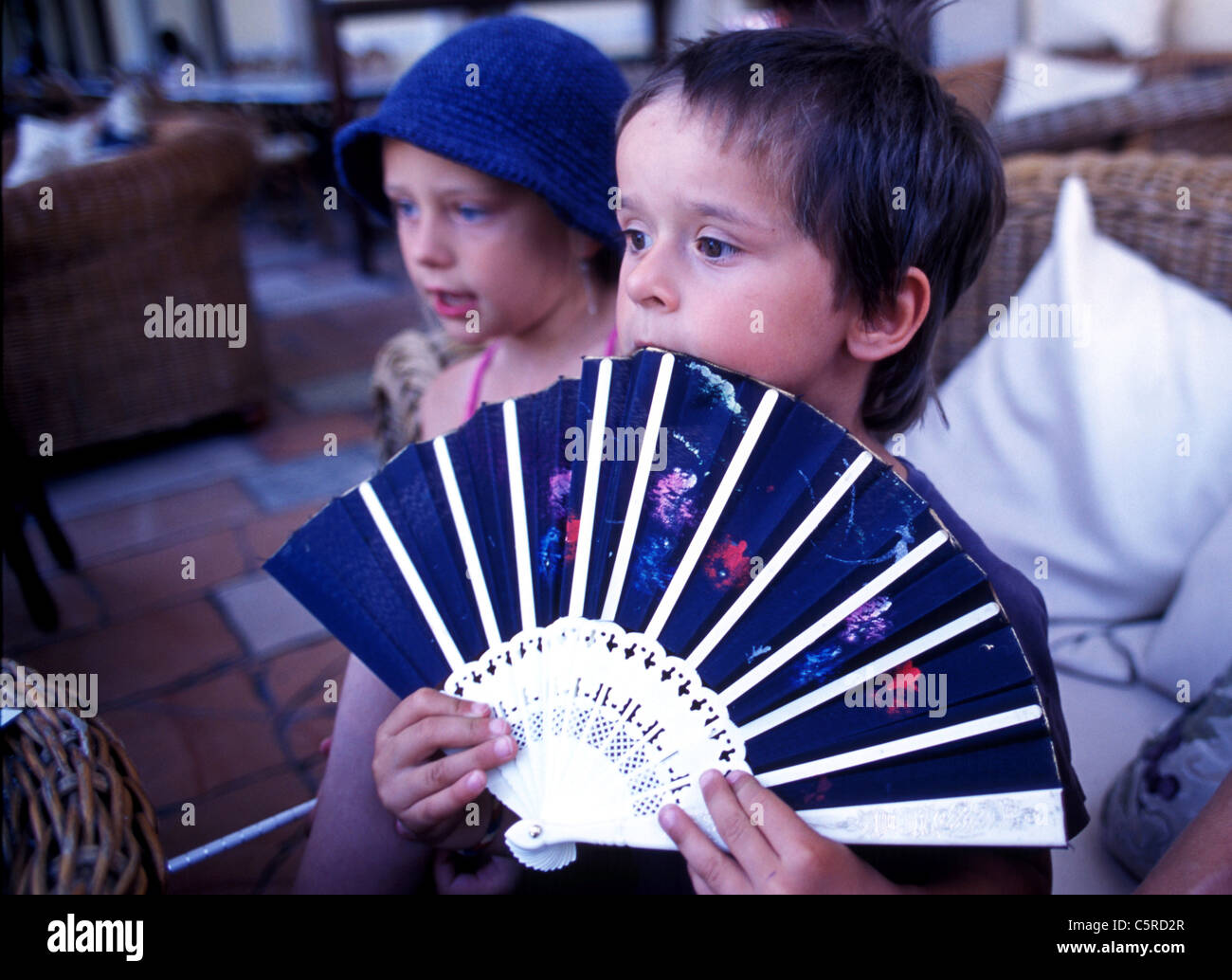 Children playing with a fan, Corfu town (Kerkyra), Corfu Greece Stock ...