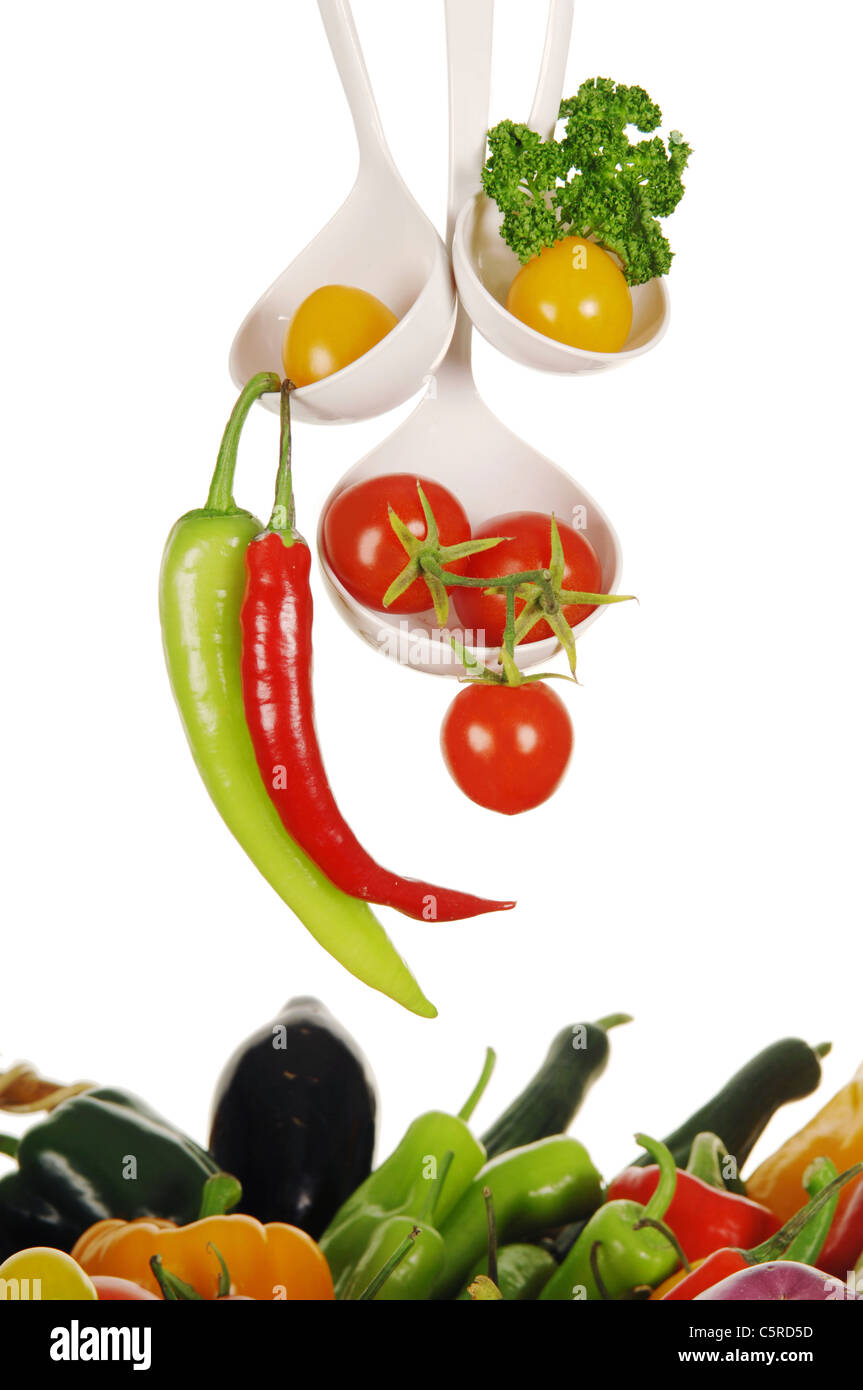 Variety of vegetables in ladles Stock Photo - Alamy