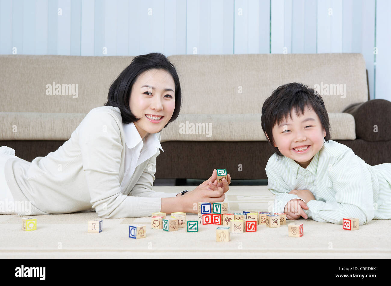 Alphabet blocks mom hi-res stock photography and images - Alamy