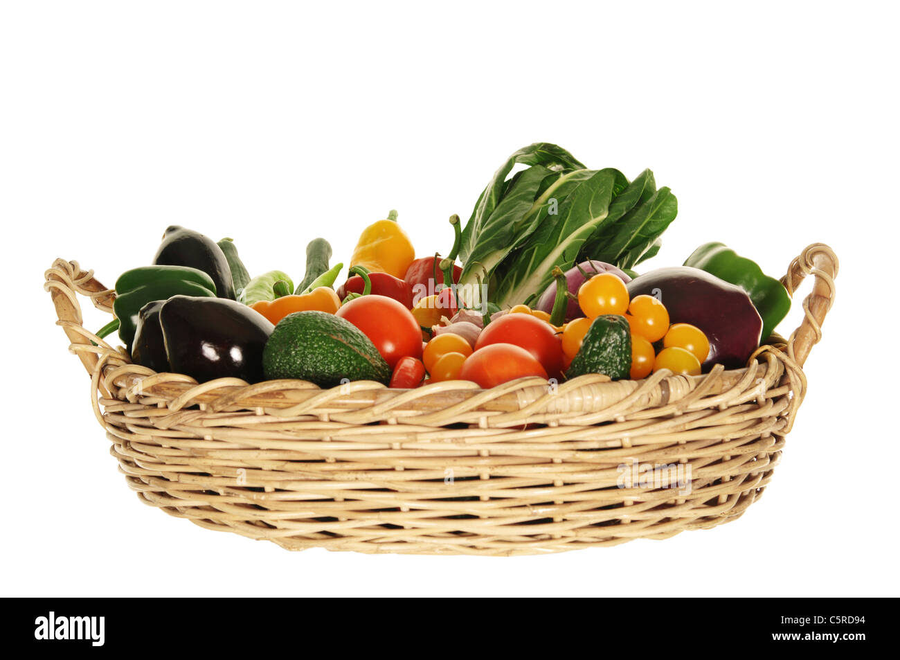 Variety of vegetables in basket Stock Photo - Alamy