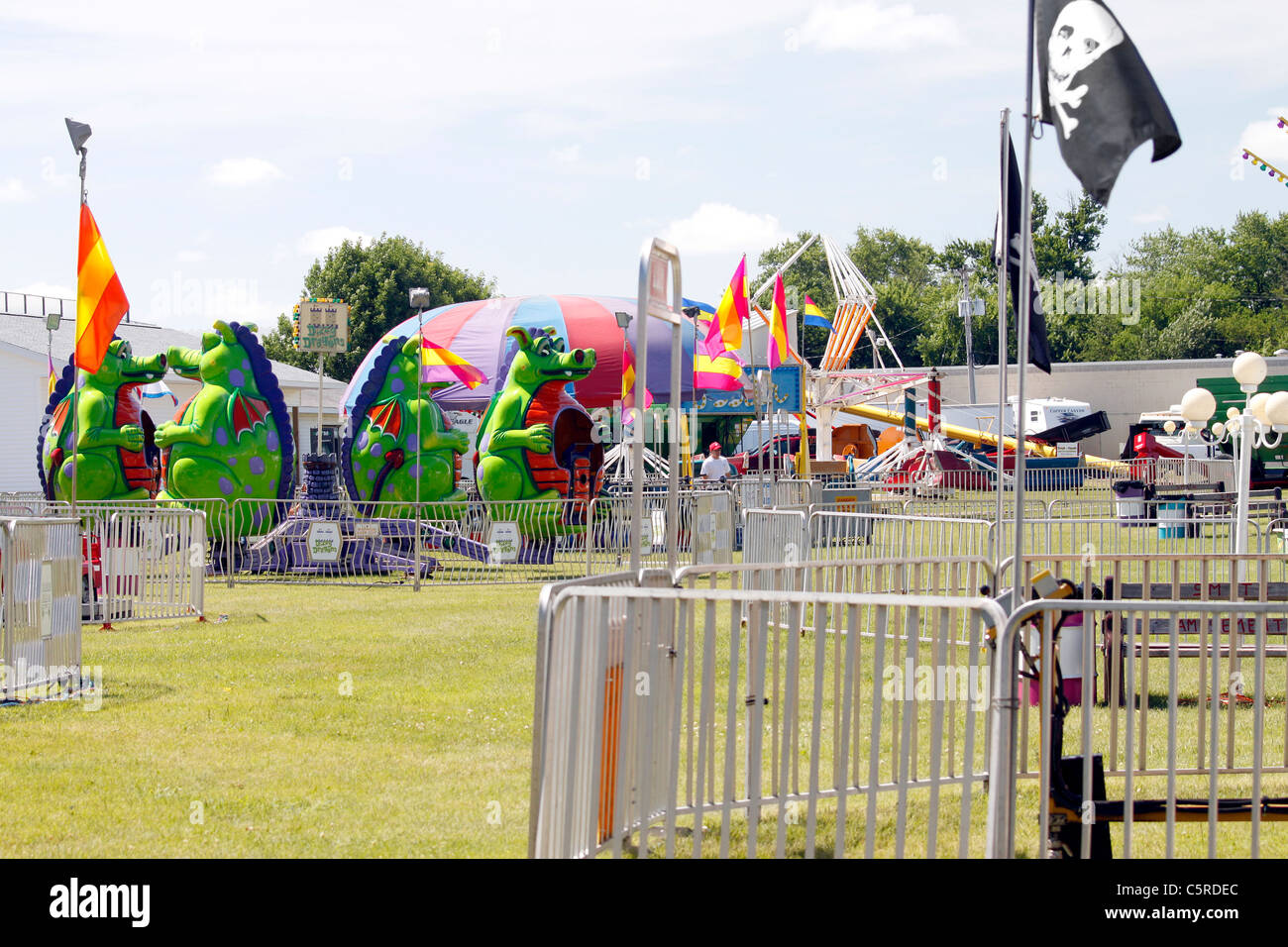 Bright vibrant colored Amusement rides at County Fair Stock Photo - Alamy
