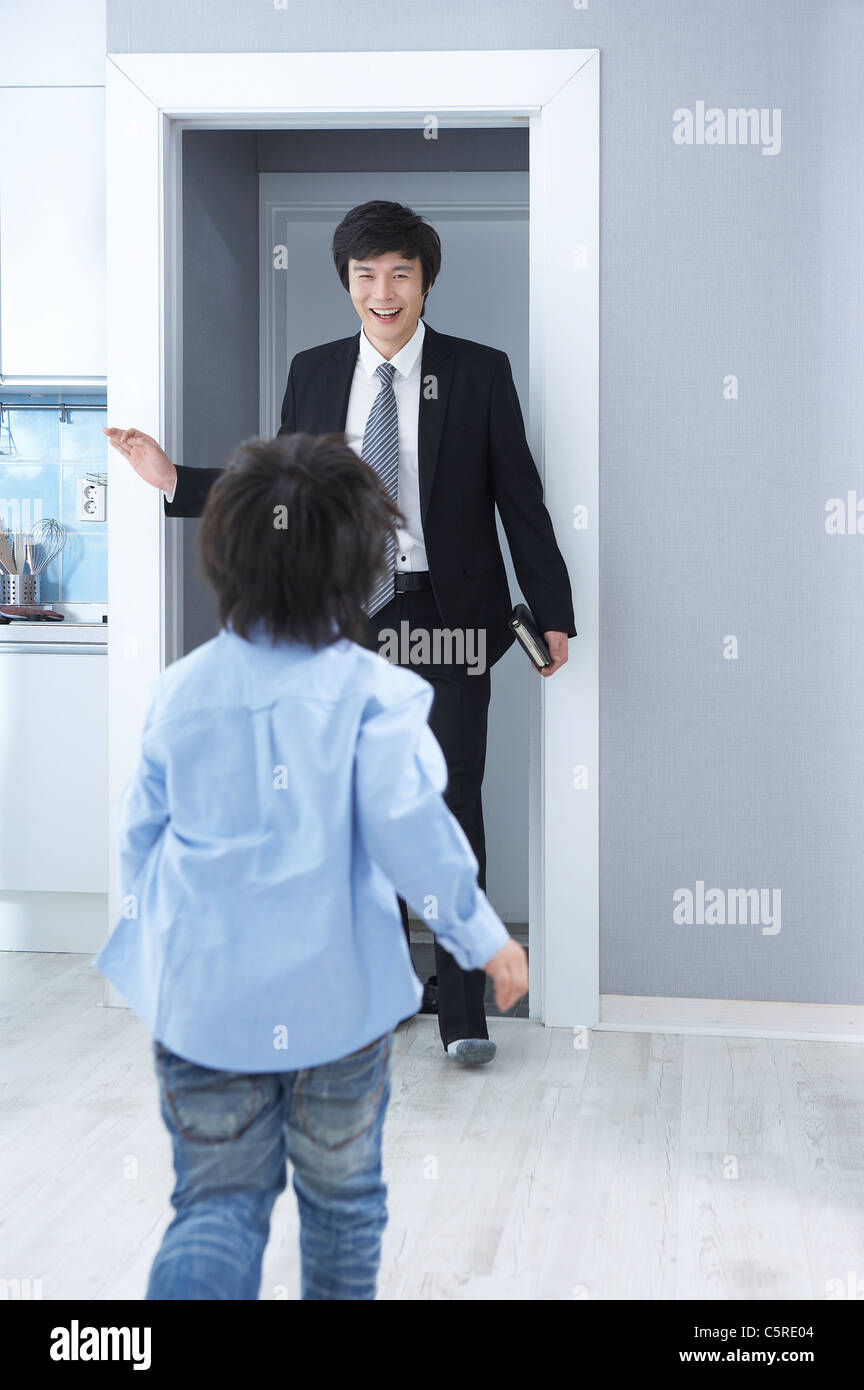 Son welcoming father home hi-res stock photography and images - Alamy