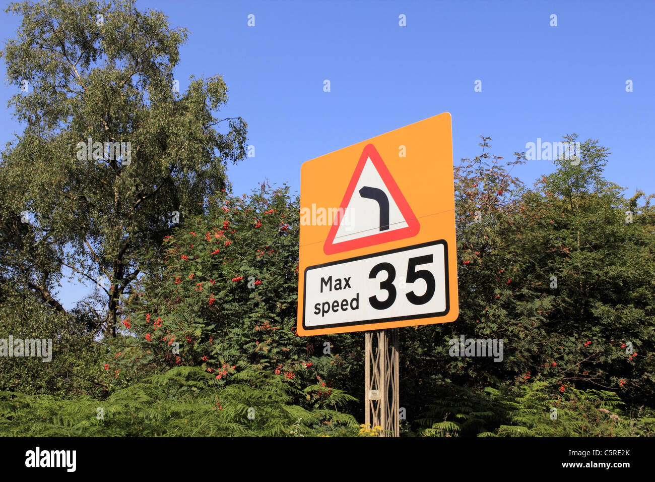 35 max speed and bend in road sign Hindhead Surrey England UK Stock ...