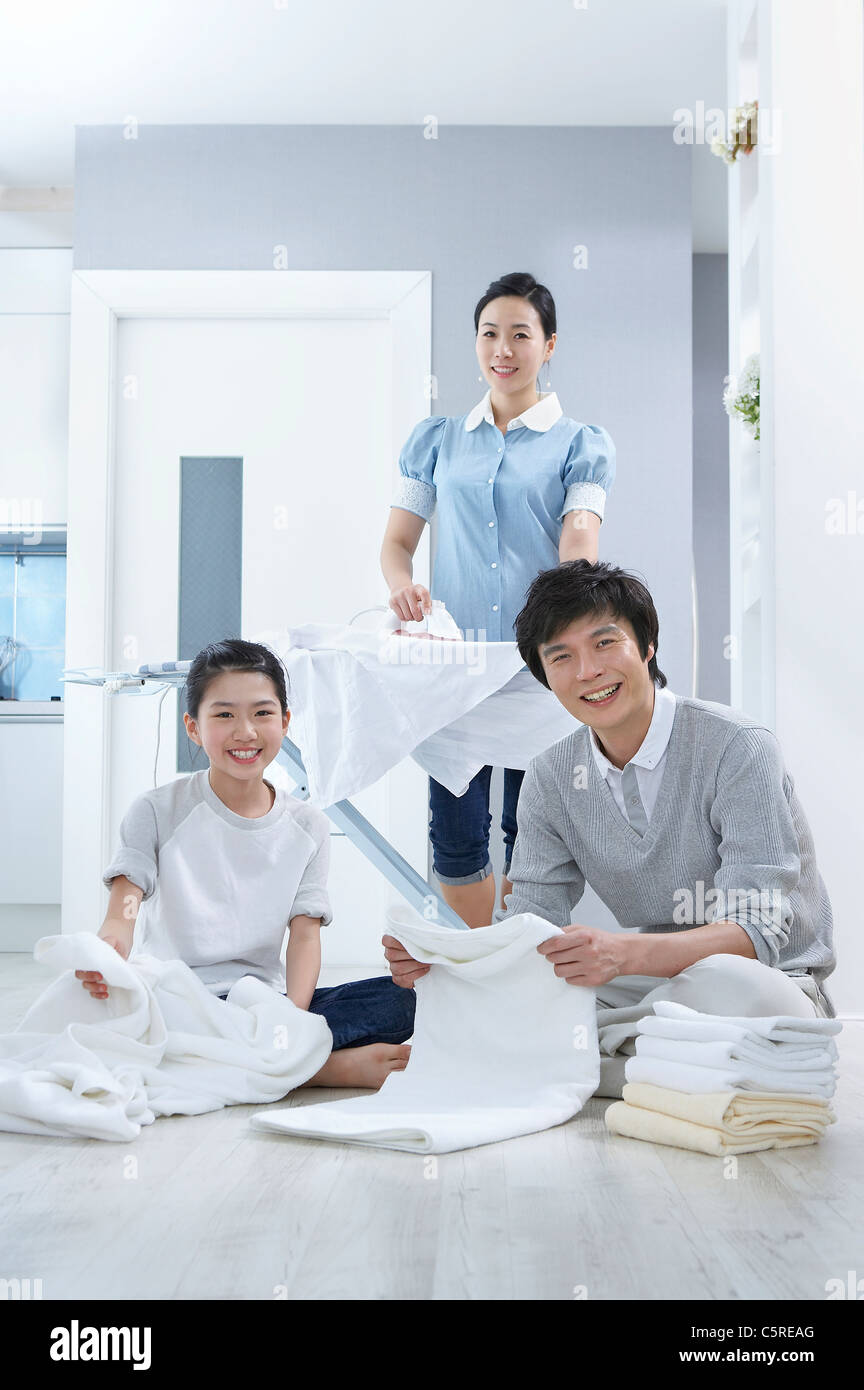 Family members doing chores hi-res stock photography and images - Alamy