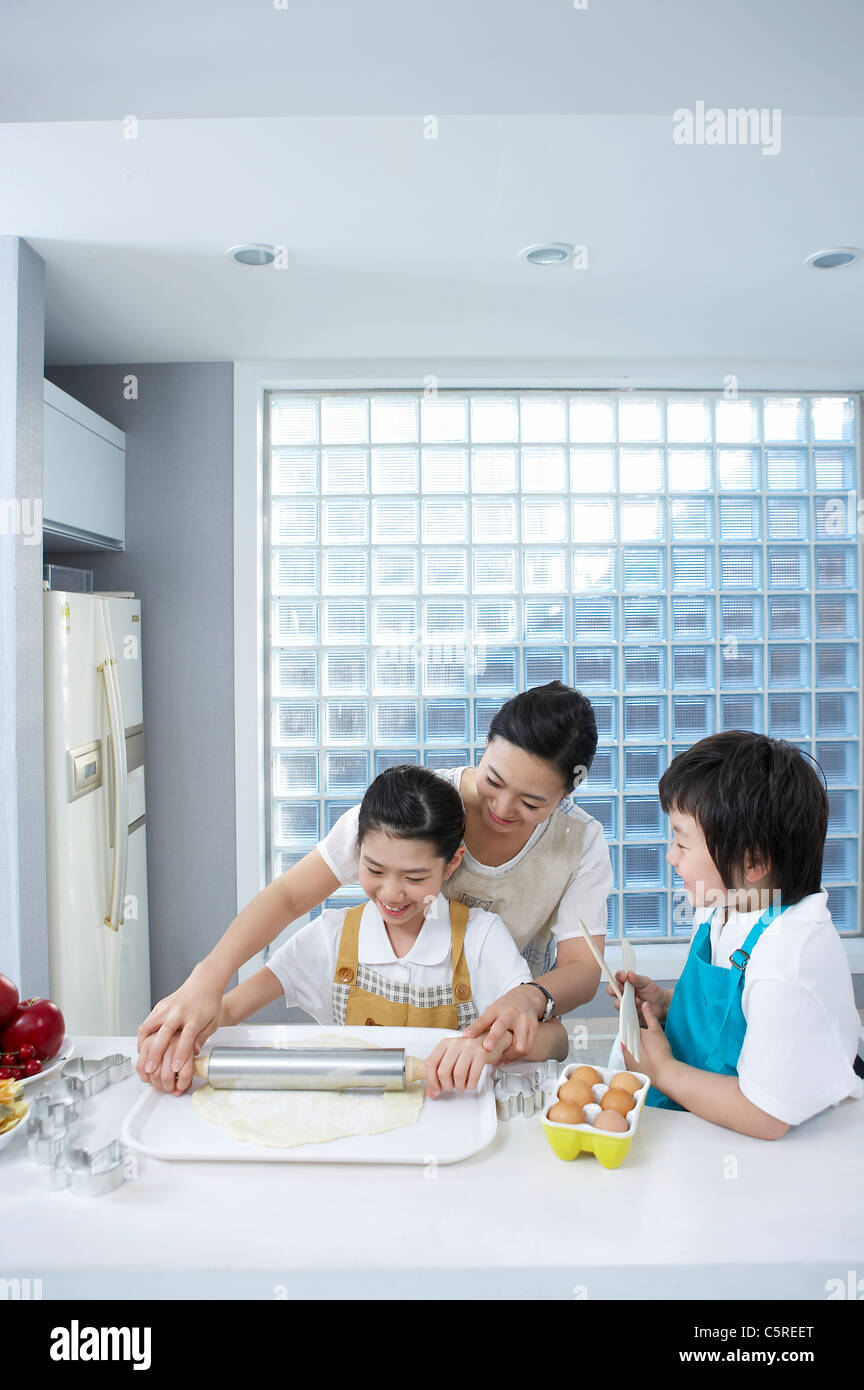 A family having a good time cooking Stock Photo - Alamy