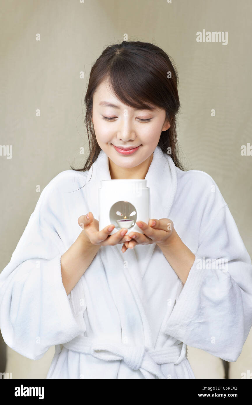 A woman smelling aroma Stock Photo - Alamy