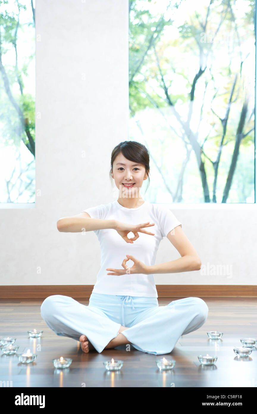 A woman doing yoga pose Stock Photo - Alamy