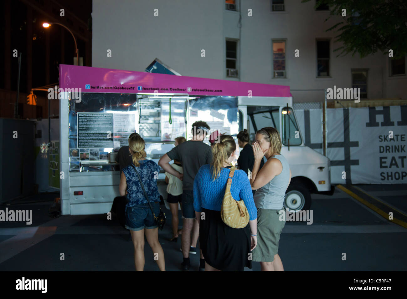 Customers queue up for ice cream from the popular Coolhaus ice cream ...