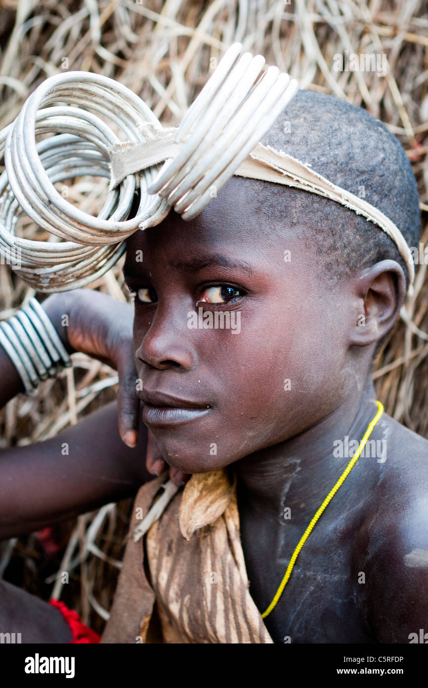 Portrait of a child from the Mursi tribe at a village in Mago National ...