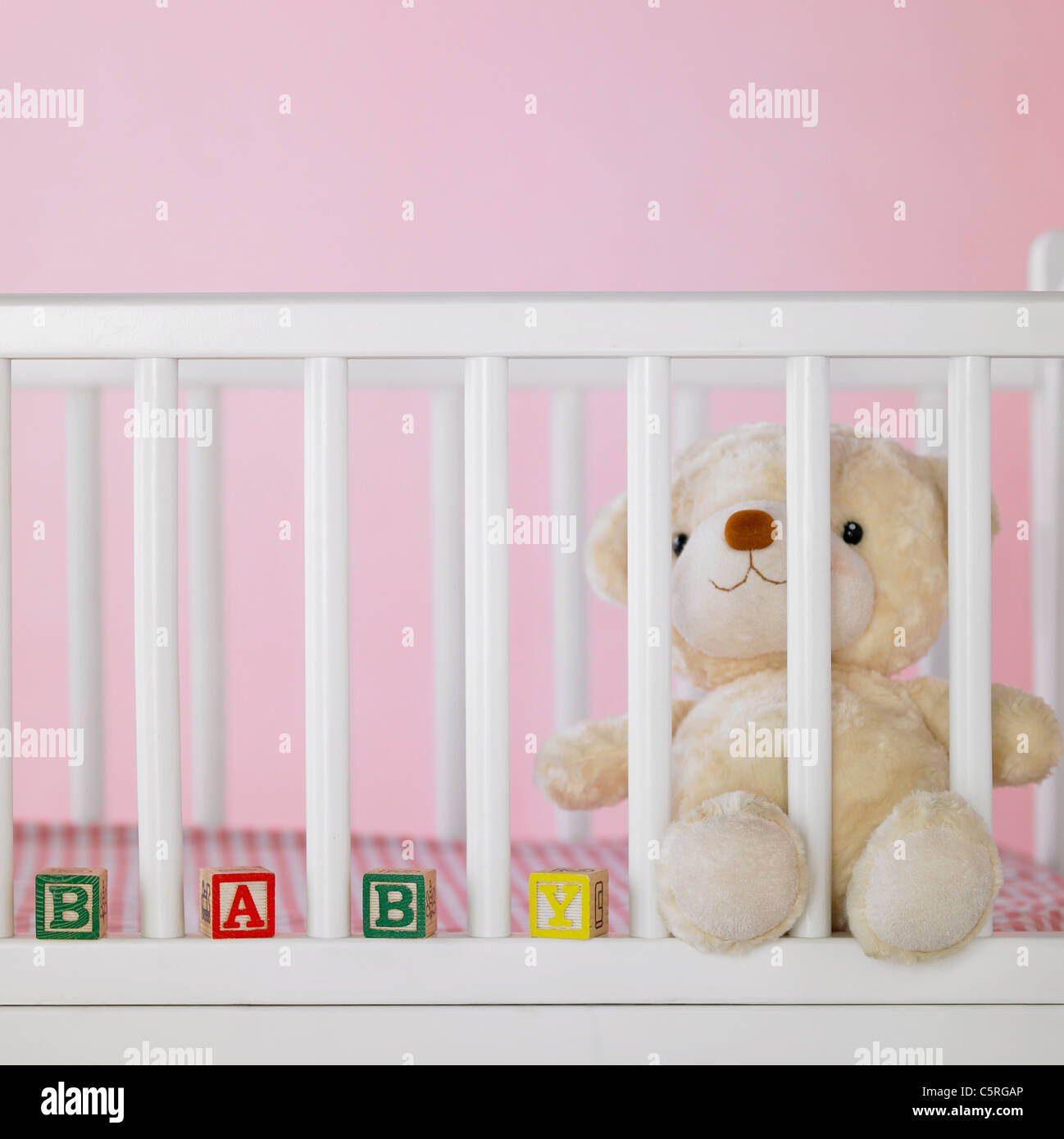 Baby cradle with baby dolls hi-res stock photography and images - Alamy