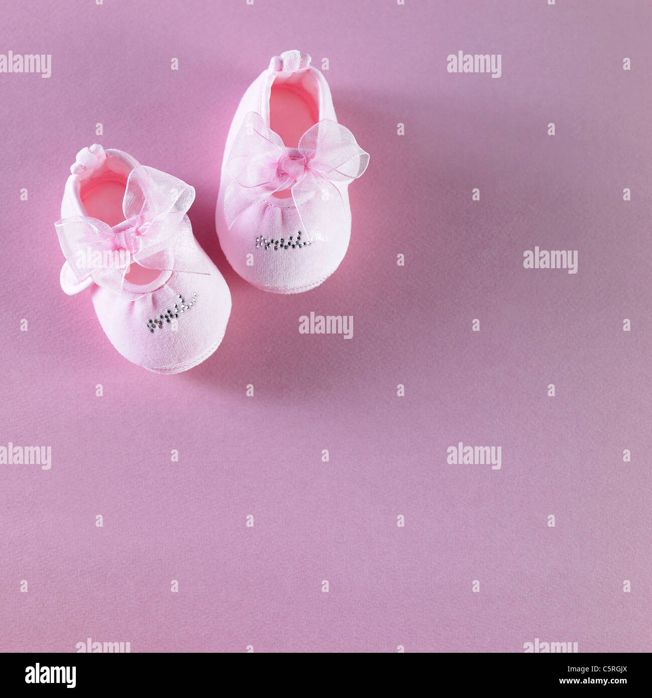 Cutout baby shoes hi-res stock photography and images - Alamy