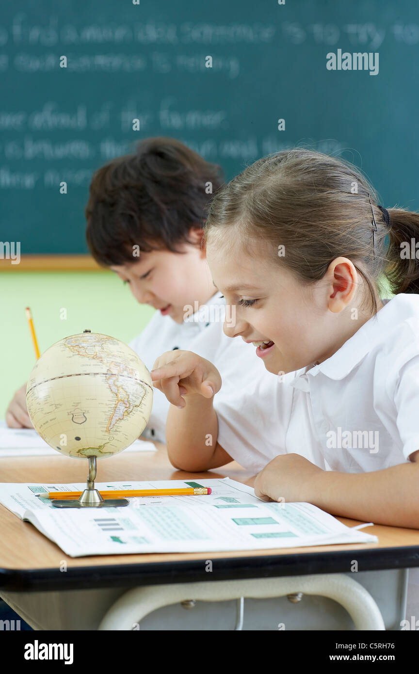 Two Asian students studying in the class Stock Photo - Alamy