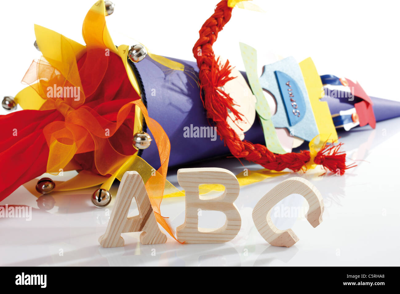 Colourful school cone, capital letters, close up Stock Photo - Alamy