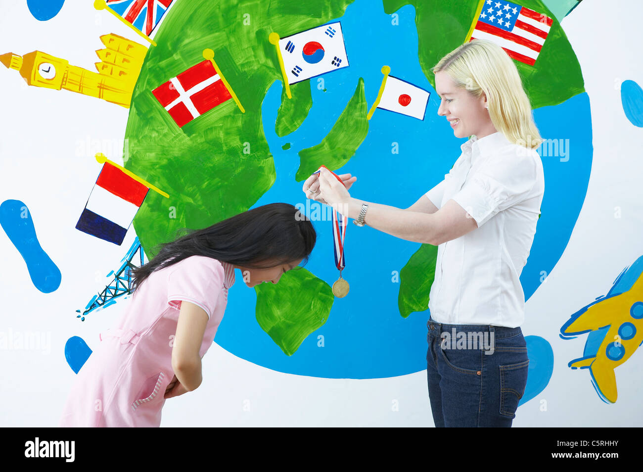 Teacher awarding student hi-res stock photography and images - Alamy