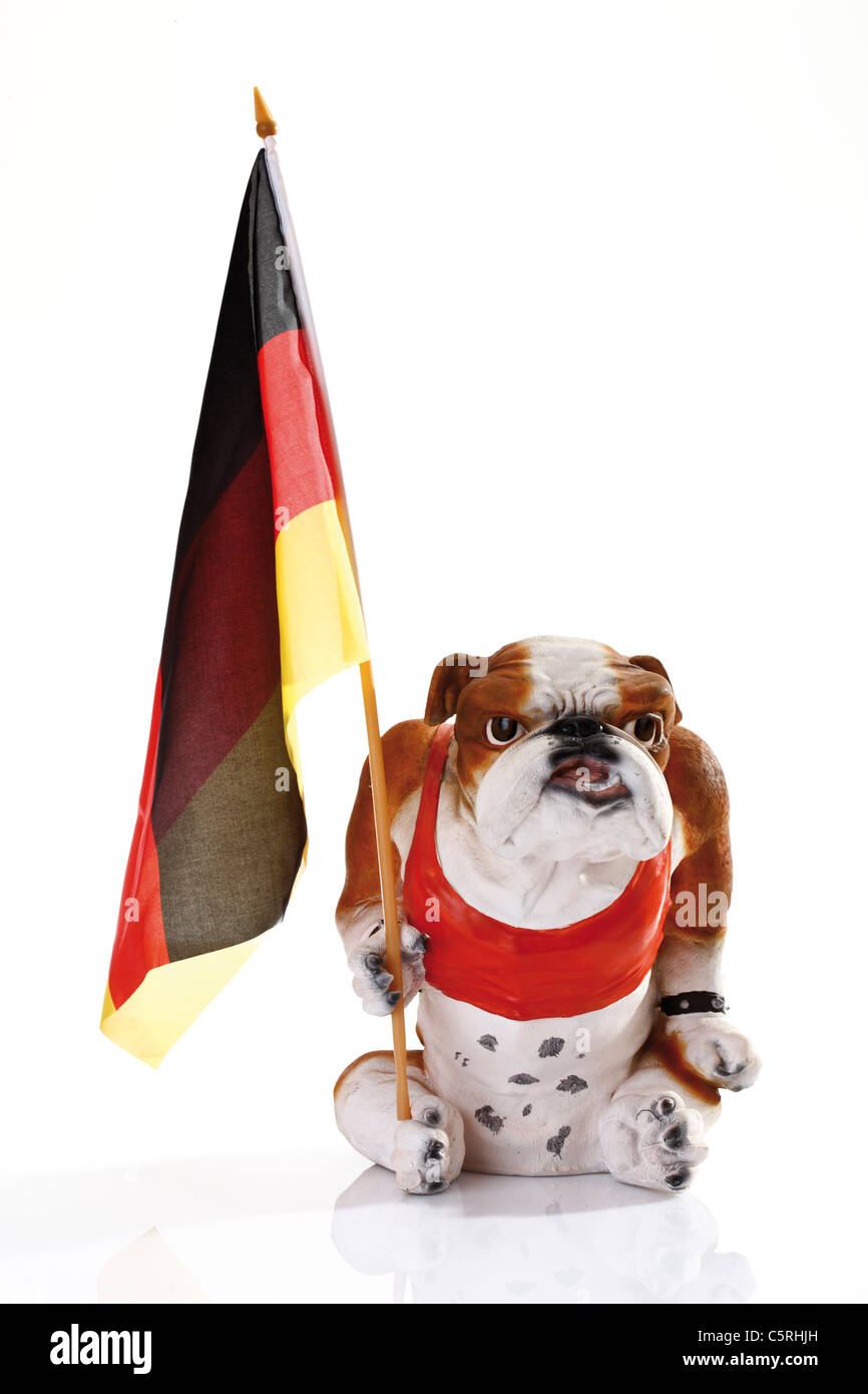 Bulldog figurine holding german flag hi-res stock photography and ...