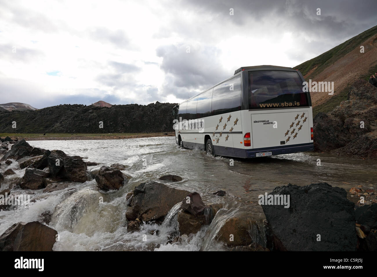 Tour bus driving in iceland hi-res stock photography and images - Alamy