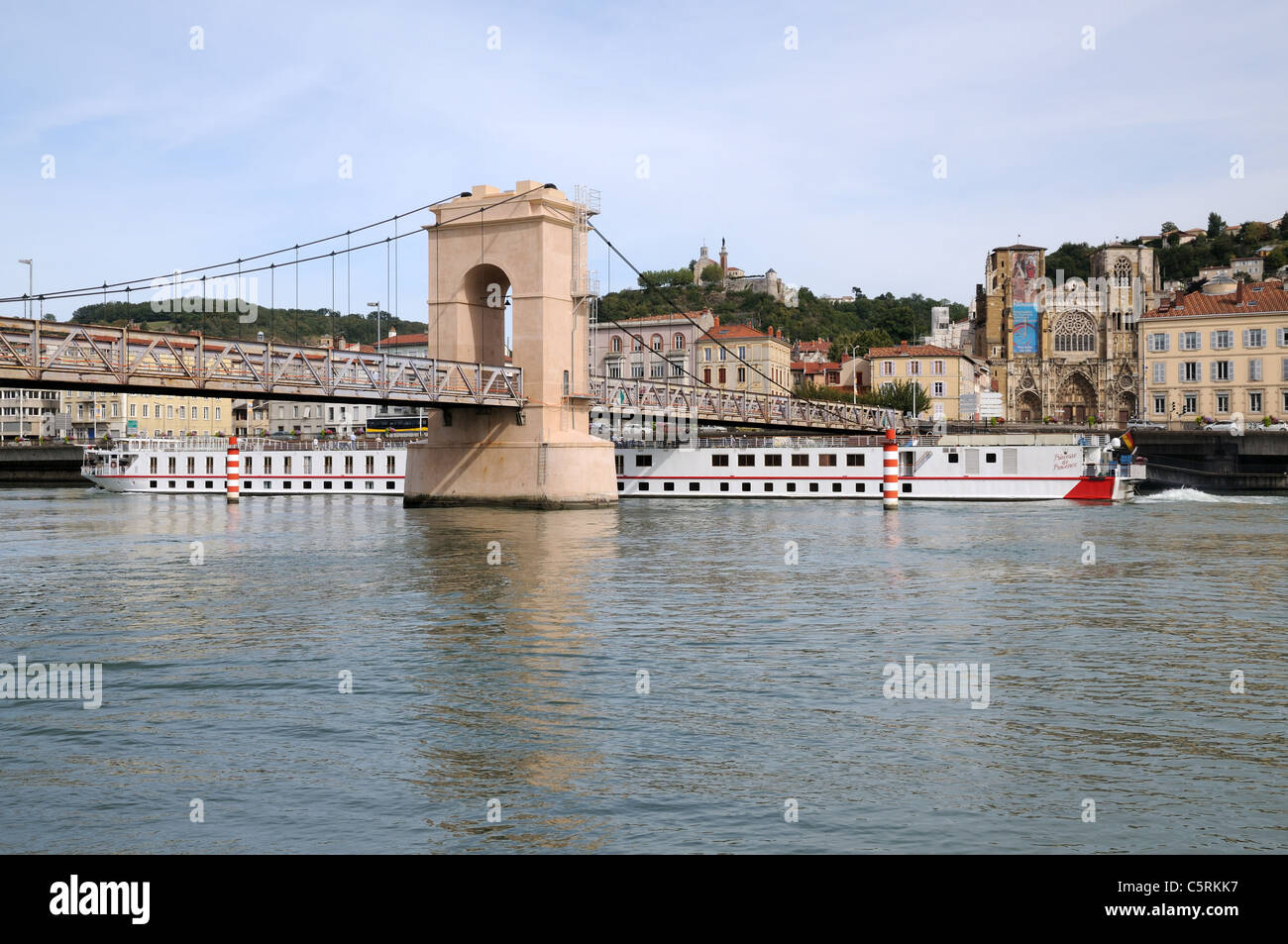 Rhone river cruise boat going under footbridge Vienne France with ...