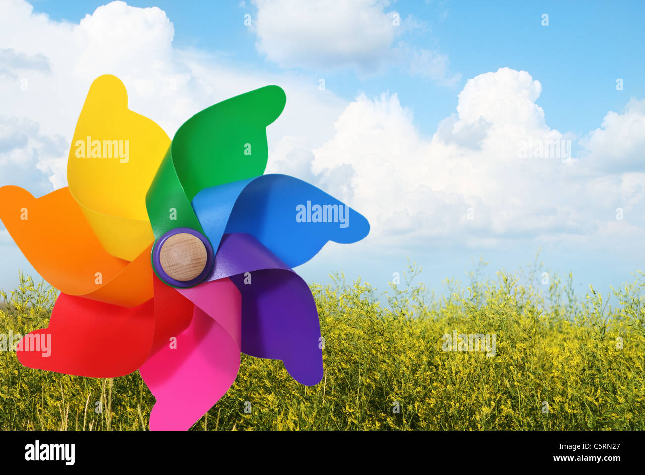 Toy wind turbine at flower summer field Stock Photo - Alamy
