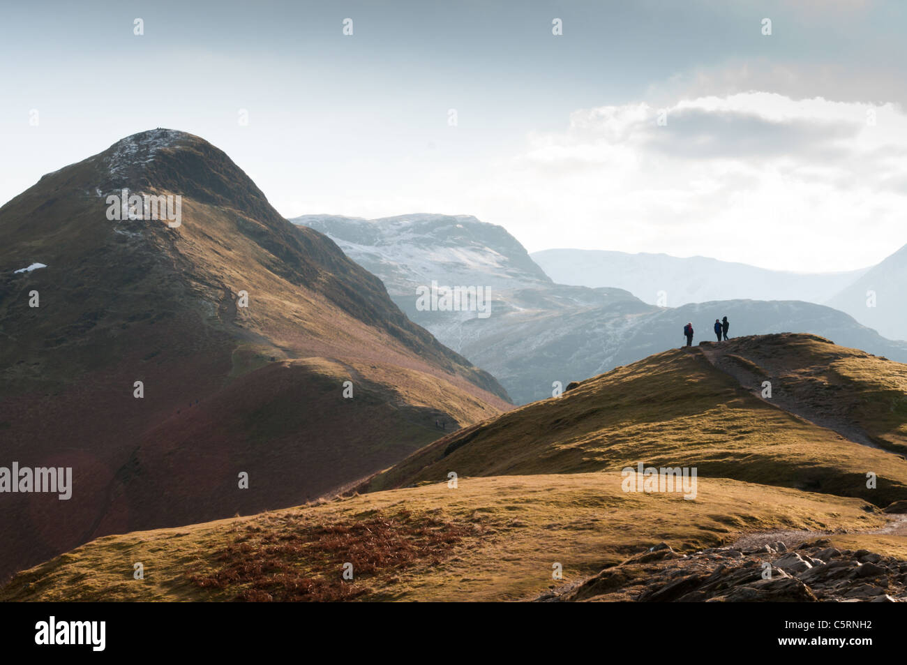 Lake district - Cat Bells in the winter with walkers Stock Photo - Alamy