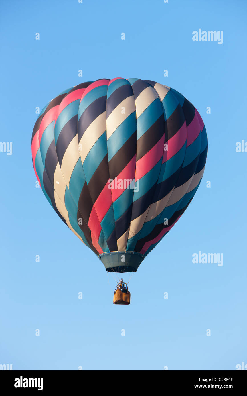 A hot air balloon rises during a morning balloon ascension 2011 ...