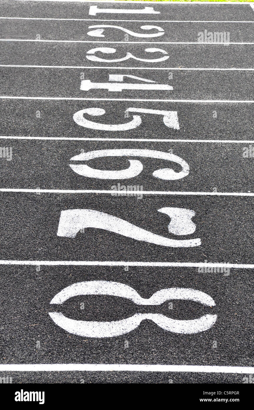 The start line on a black top running tract Stock Photo - Alamy