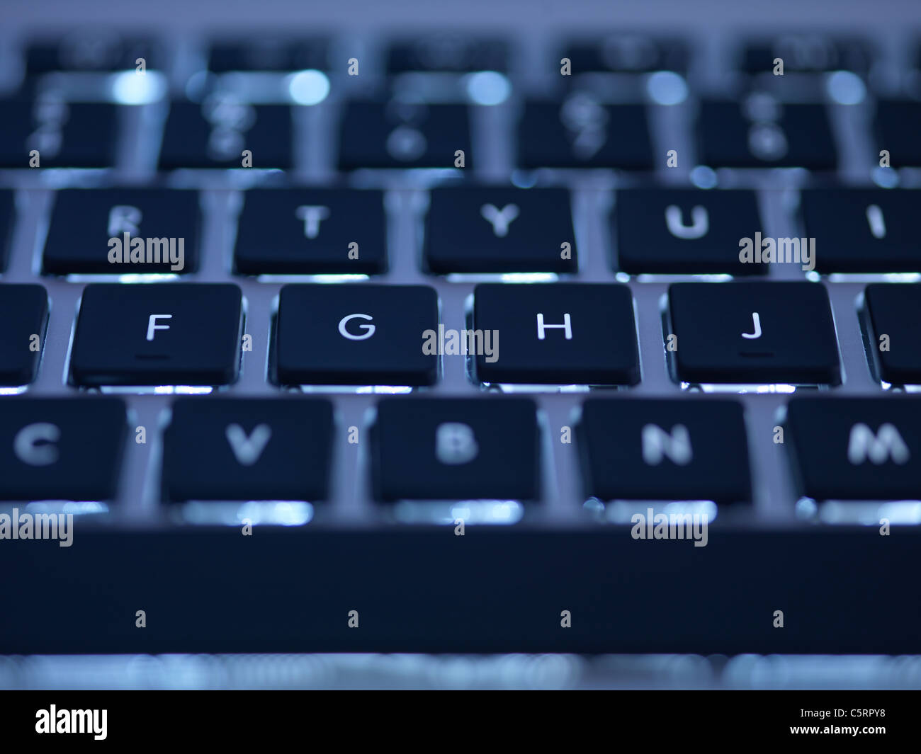 A laptop computer on a work desk Stock Photo - Alamy
