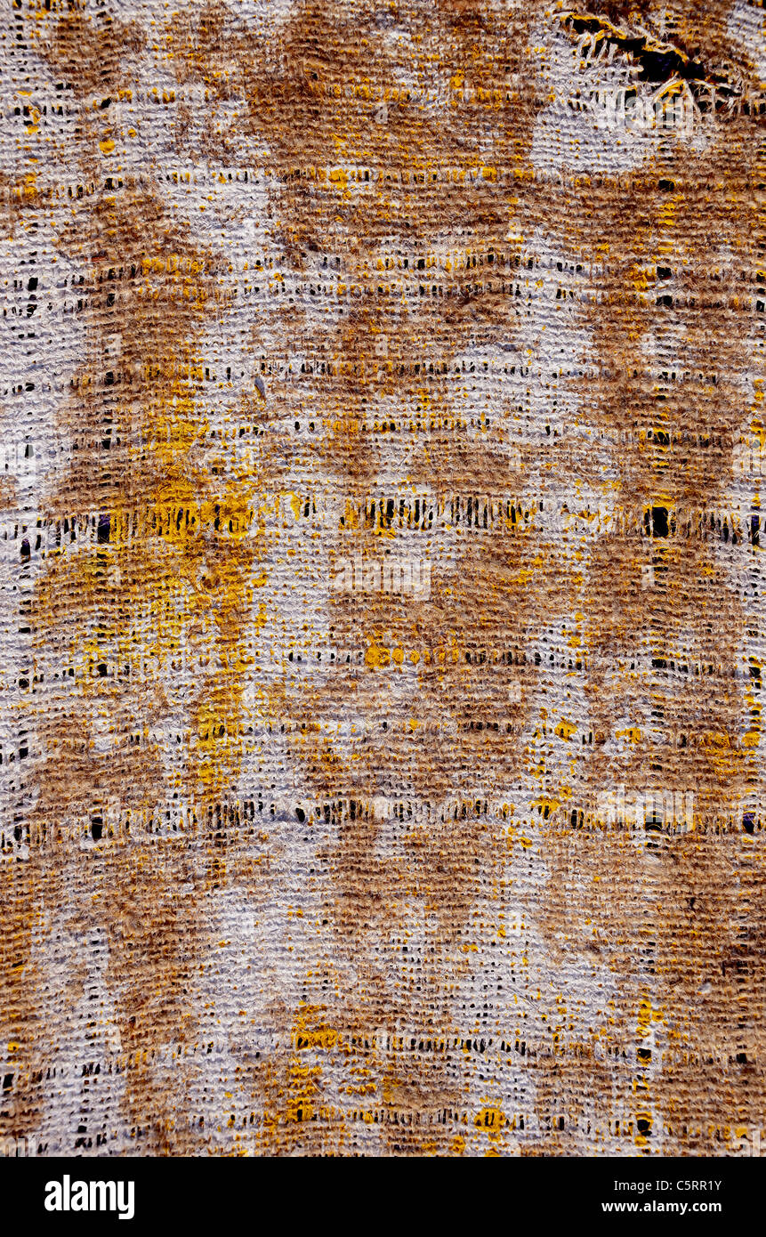 Vintage background. Very old material texture with holes in it Stock ...