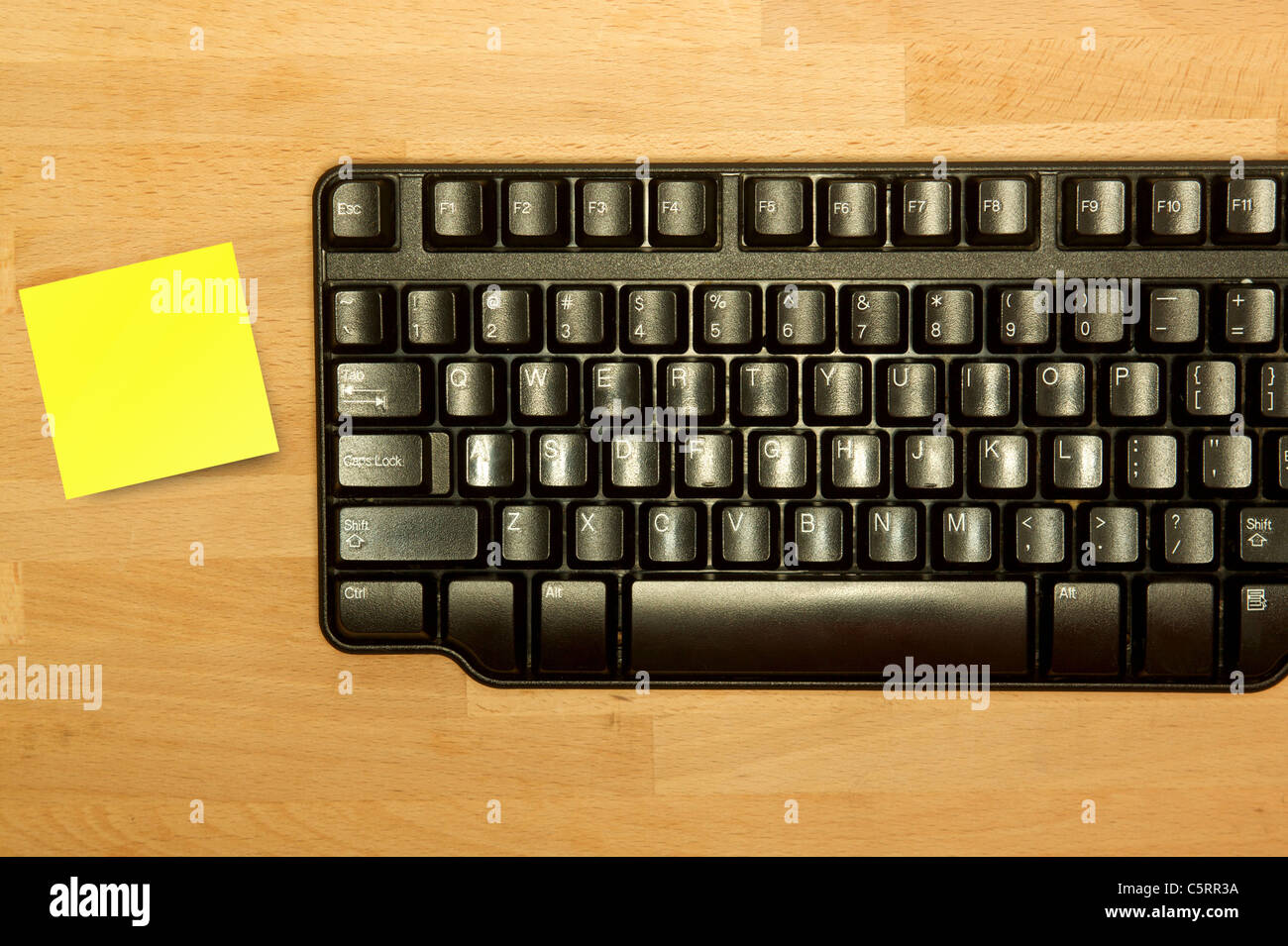 A computer keyboard on an office desk Stock Photo - Alamy