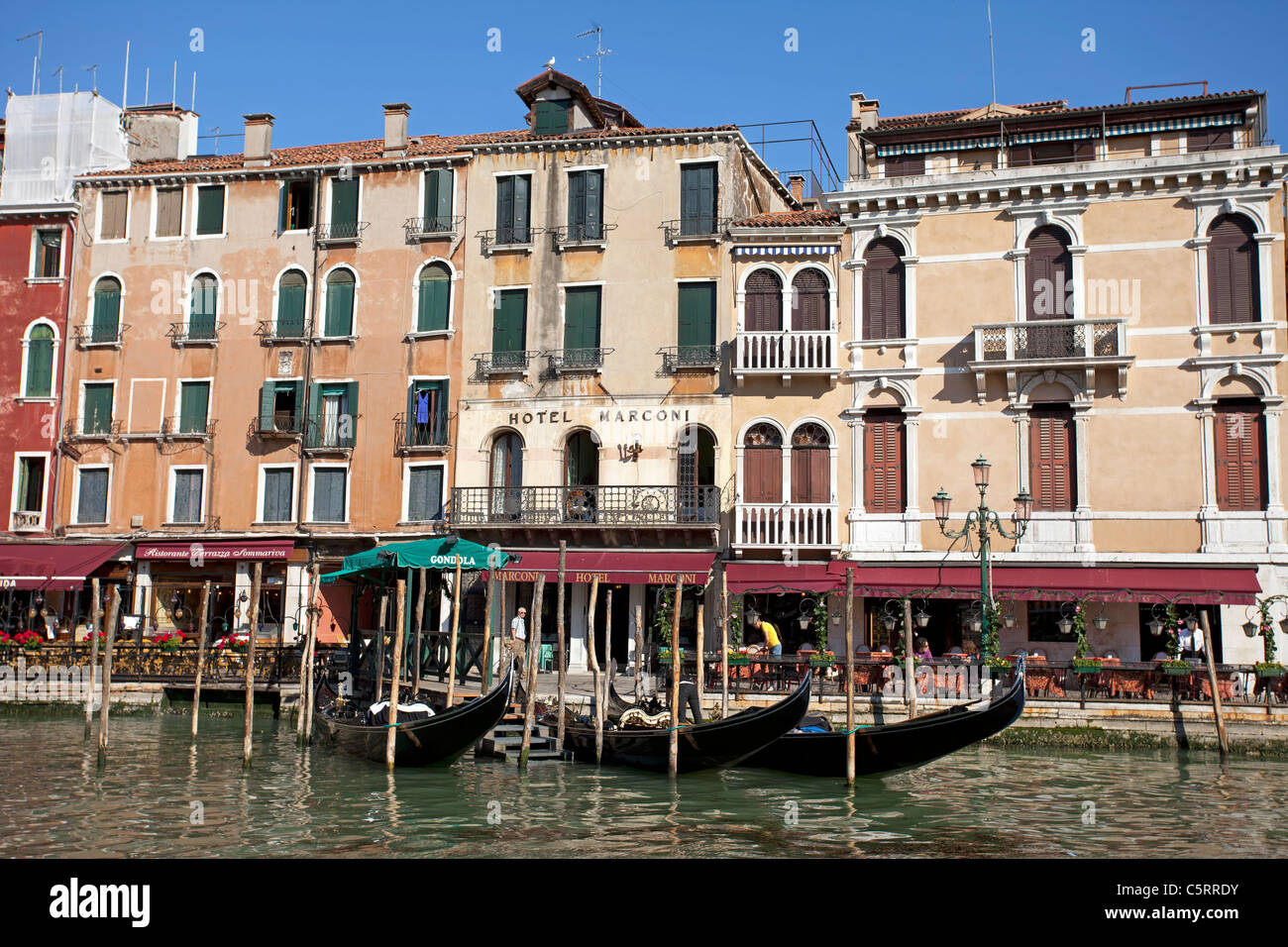 Venice, the Grand Canal between old historic buildings. Hotels line the ...