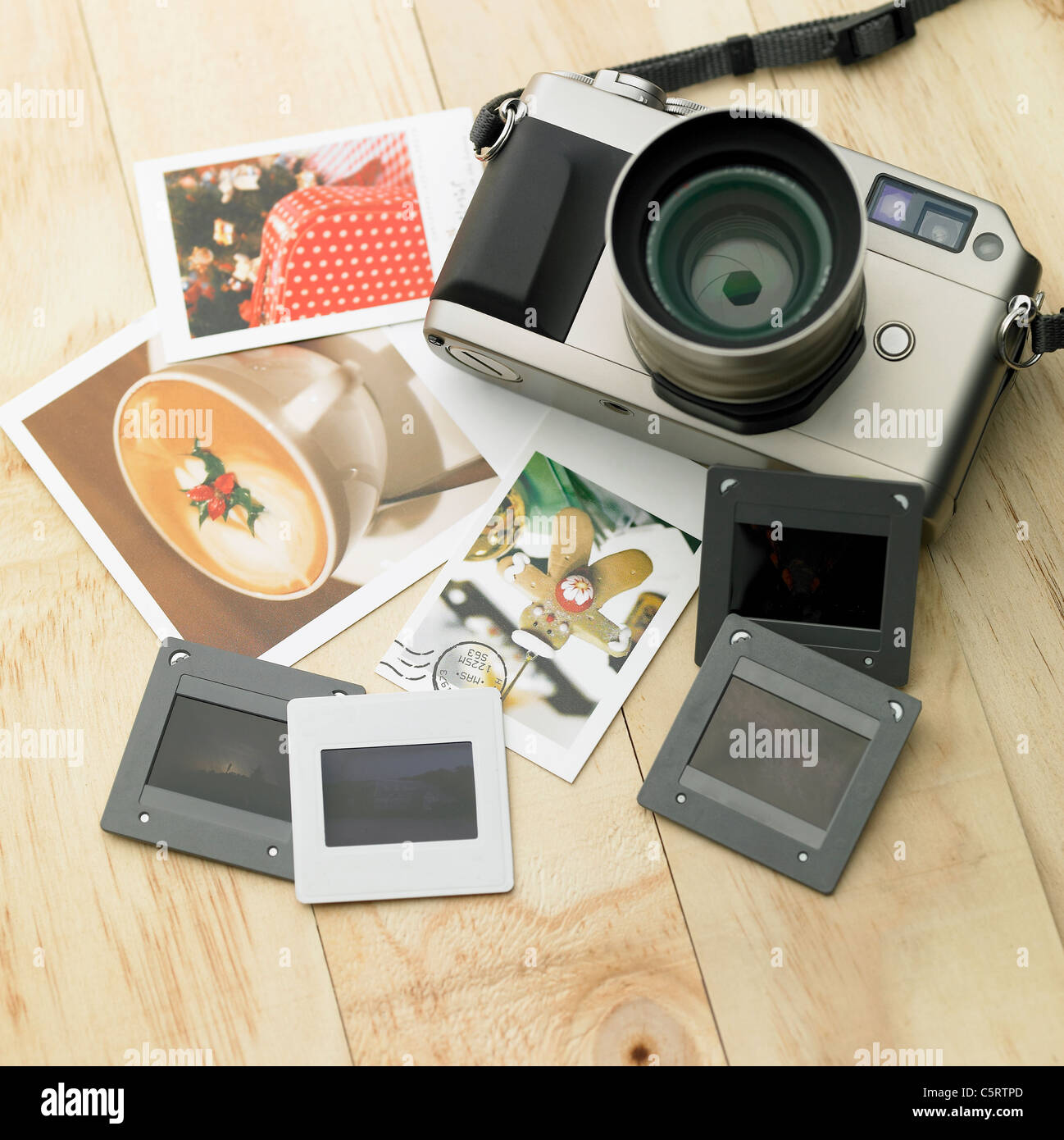 A camera with photos and films Stock Photo - Alamy