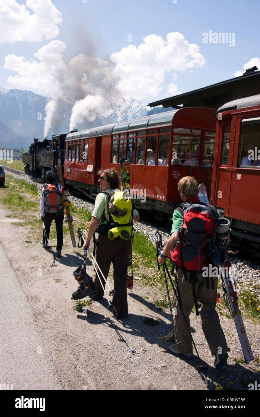 Austria, Tyrol, People and steam engine Stock Photo - Alamy