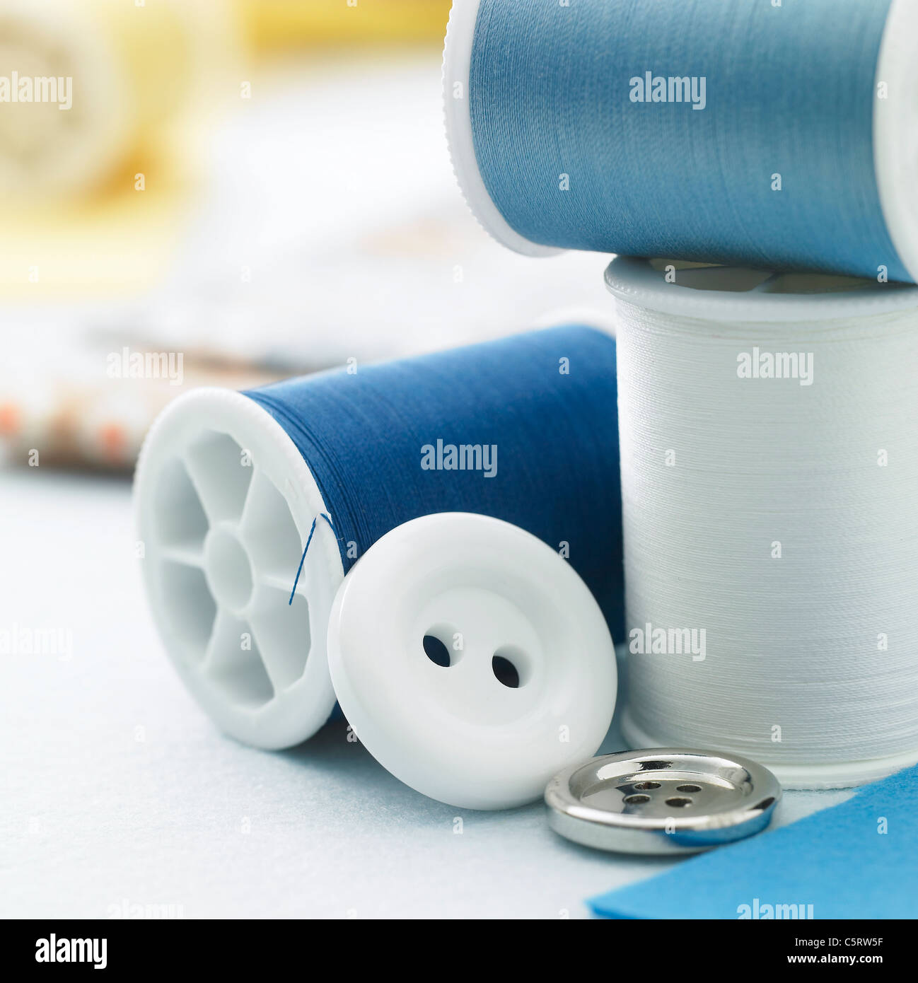 Threads and buttons Stock Photo - Alamy