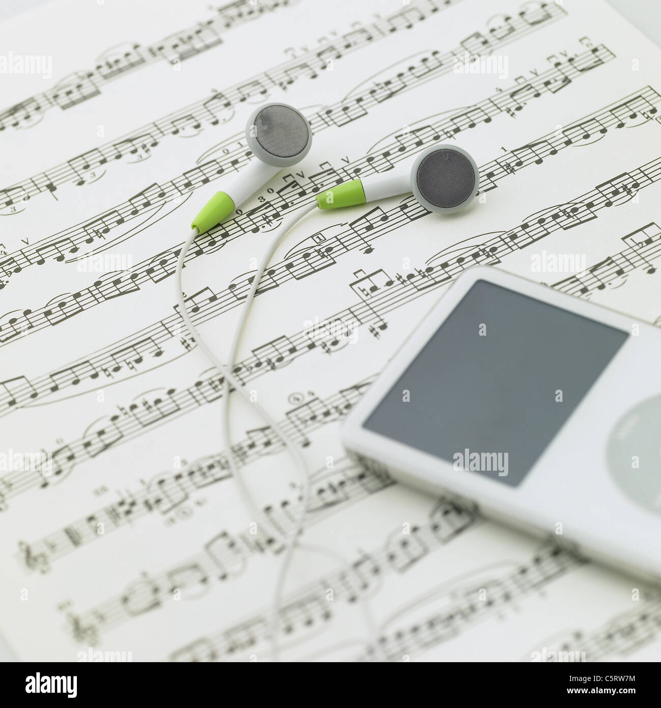 MP3 on a piano score Stock Photo - Alamy