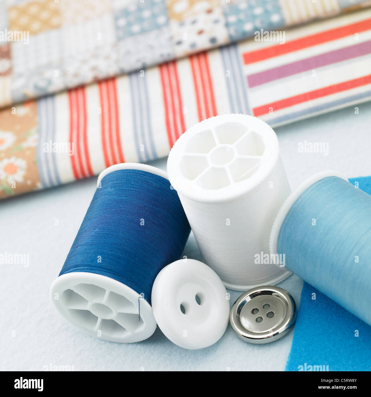 Threads and buttons Stock Photo - Alamy