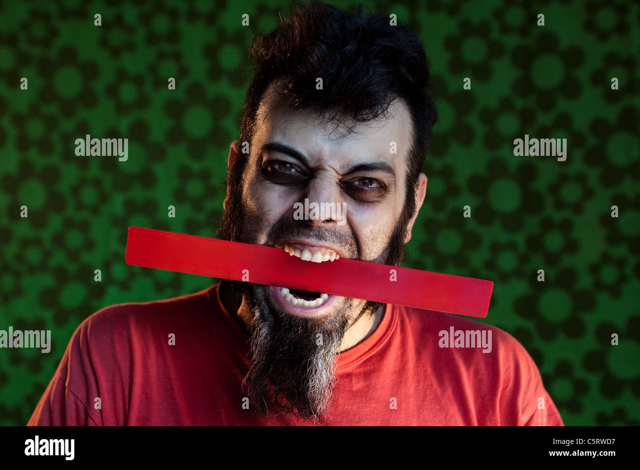 Werewolf biting a red bar, with copy space, rage against human. Horror ...