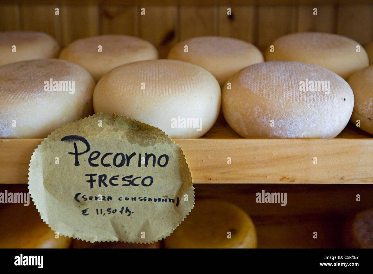 Italy, Tuscany, Pienza, Pecorino cheese in cheese shop, close-up Stock ...