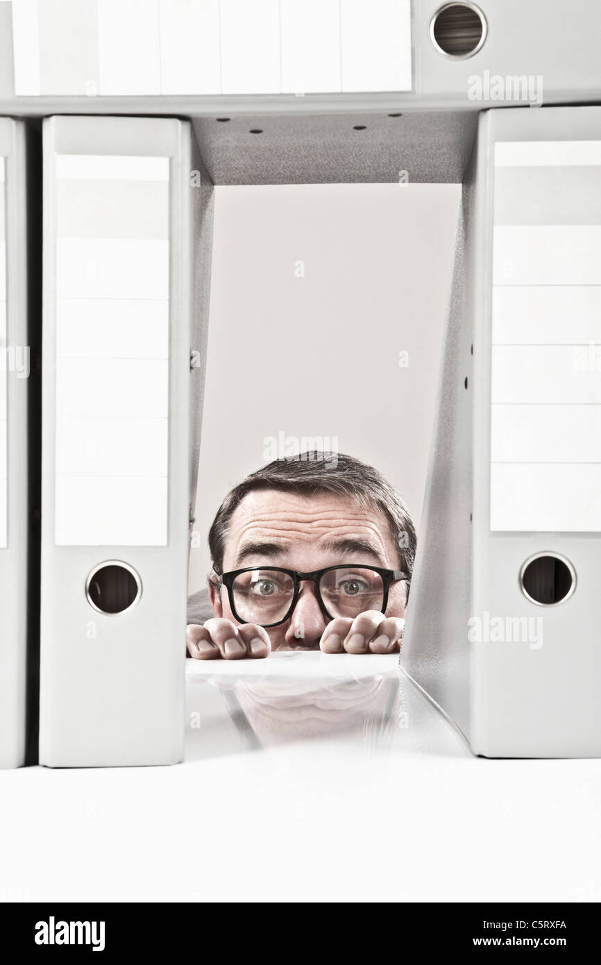 Man spectacles peeking hi-res stock photography and images - Alamy